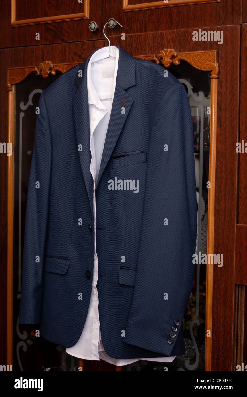 Costume hanging on hanger hi-res stock photography and images - Alamy