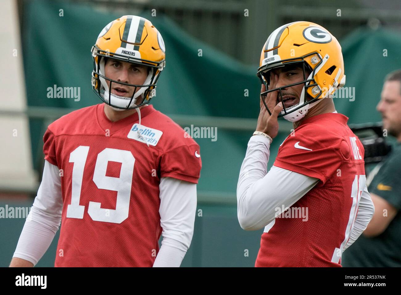 Green Bay Packers' Jordan Love talks to Danny Etling during an NFL ...