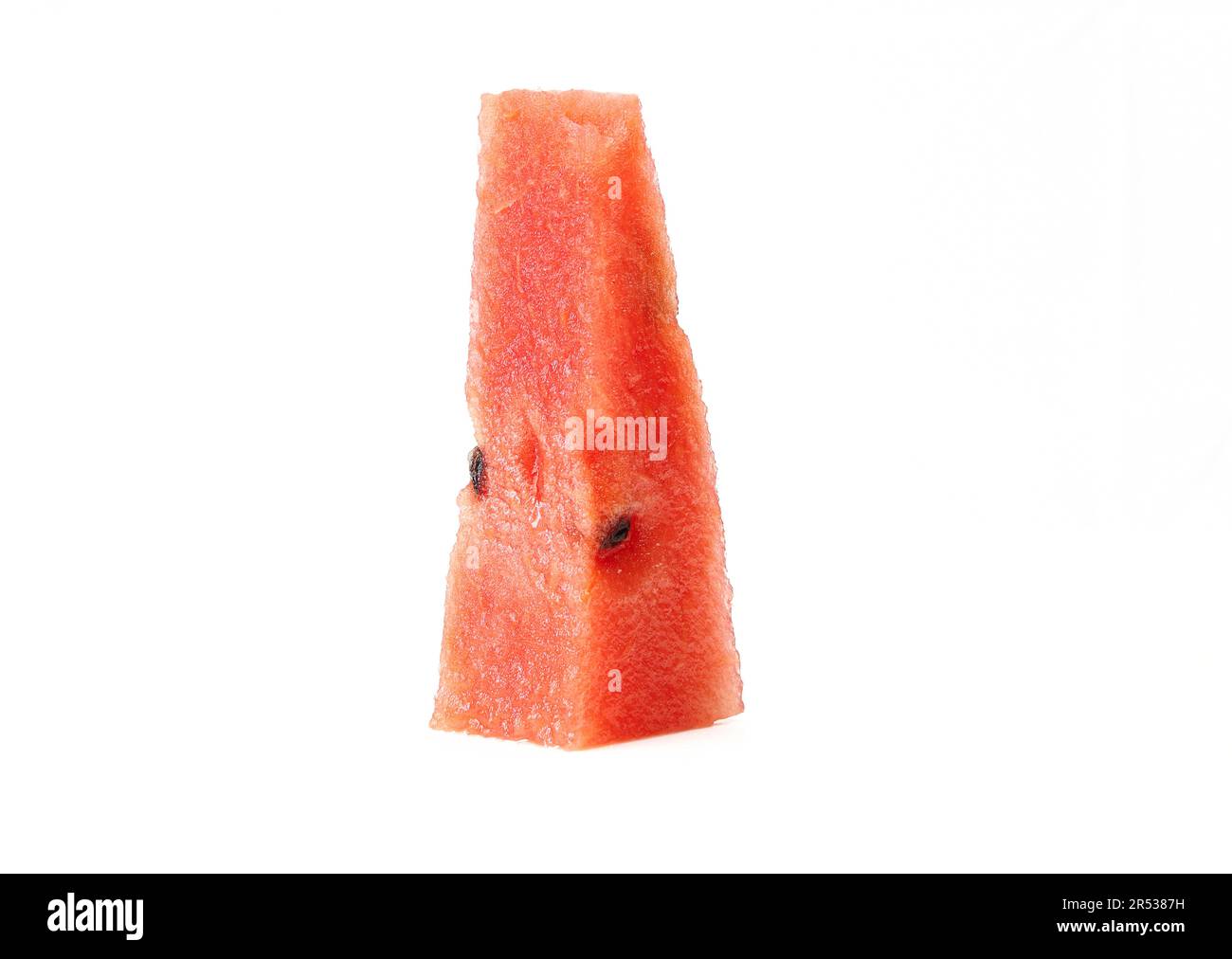 One triangle shaped watermelon slice. Piece of fruit with seeds ...