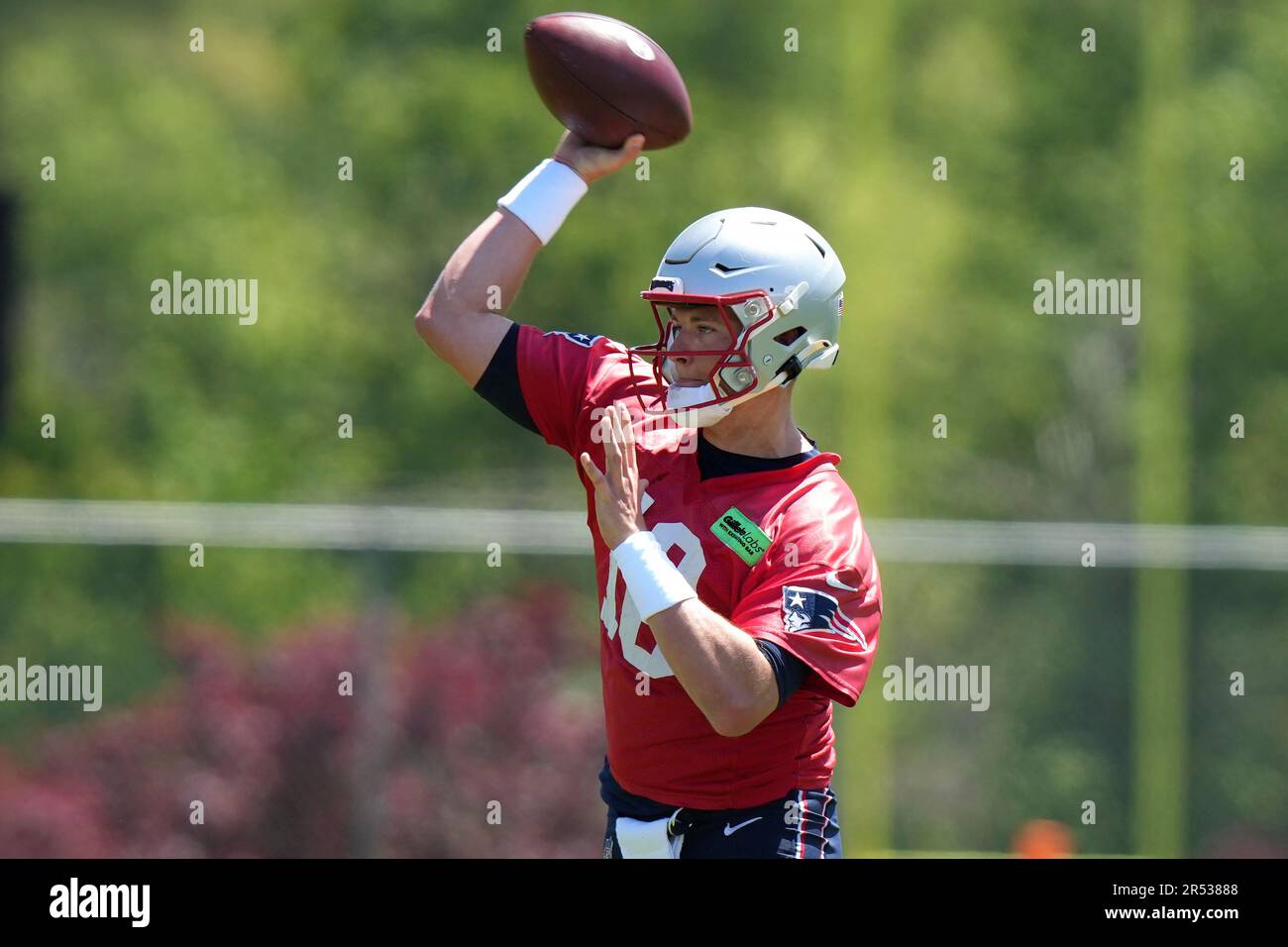 New England Patriots quarterback Mac Jones passes the ball during an ...
