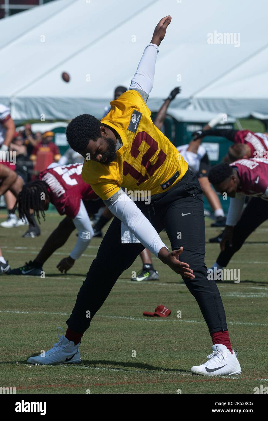 Washington Commanders quarterback Jacoby Brissett stretches during the ...