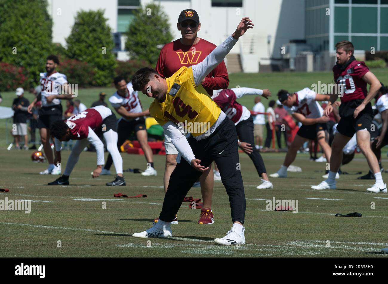 Washington Commanders quarterback Sam Howell stretches as head coach ...