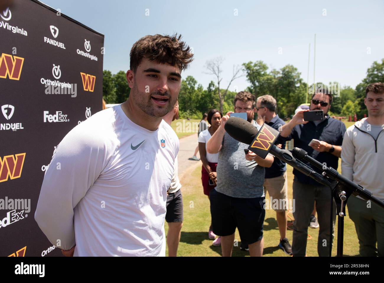 Washington Commanders quarterback Sam Howell speaks with reporters ...
