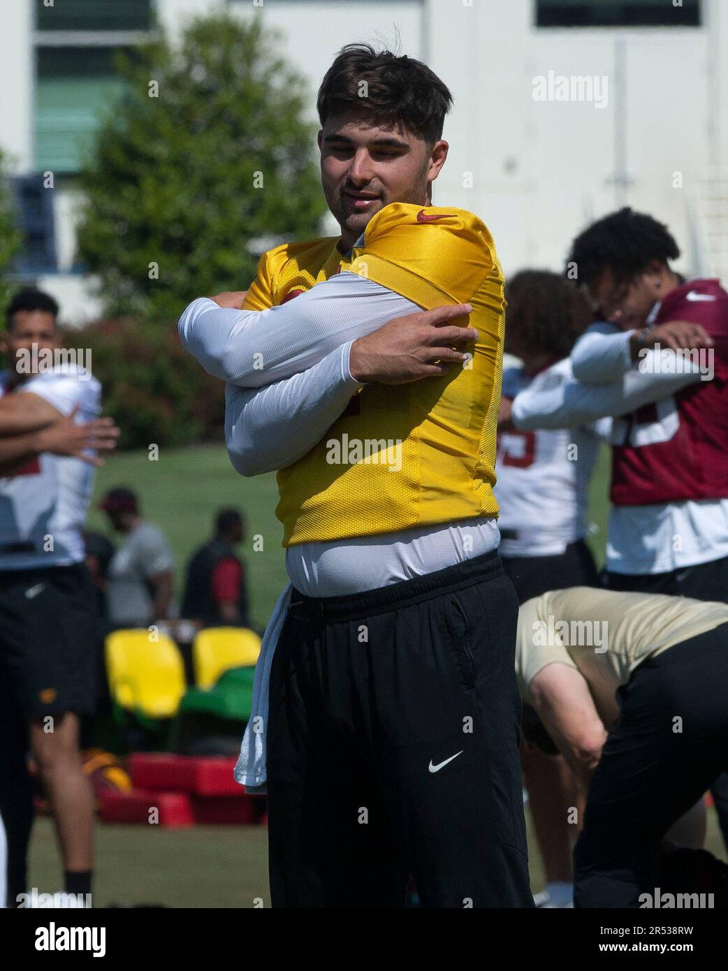 Washington Commanders quarterback Sam Howell stretches during the team ...