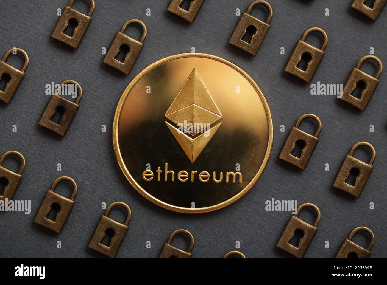Ethereum coin with padlock on black background. Ethereum security ...
