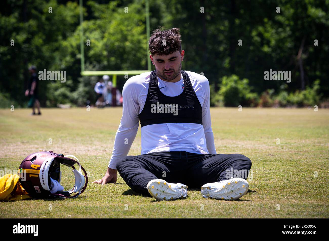 Washington Commanders quarterback Sam Howell rests after the team's NFL ...