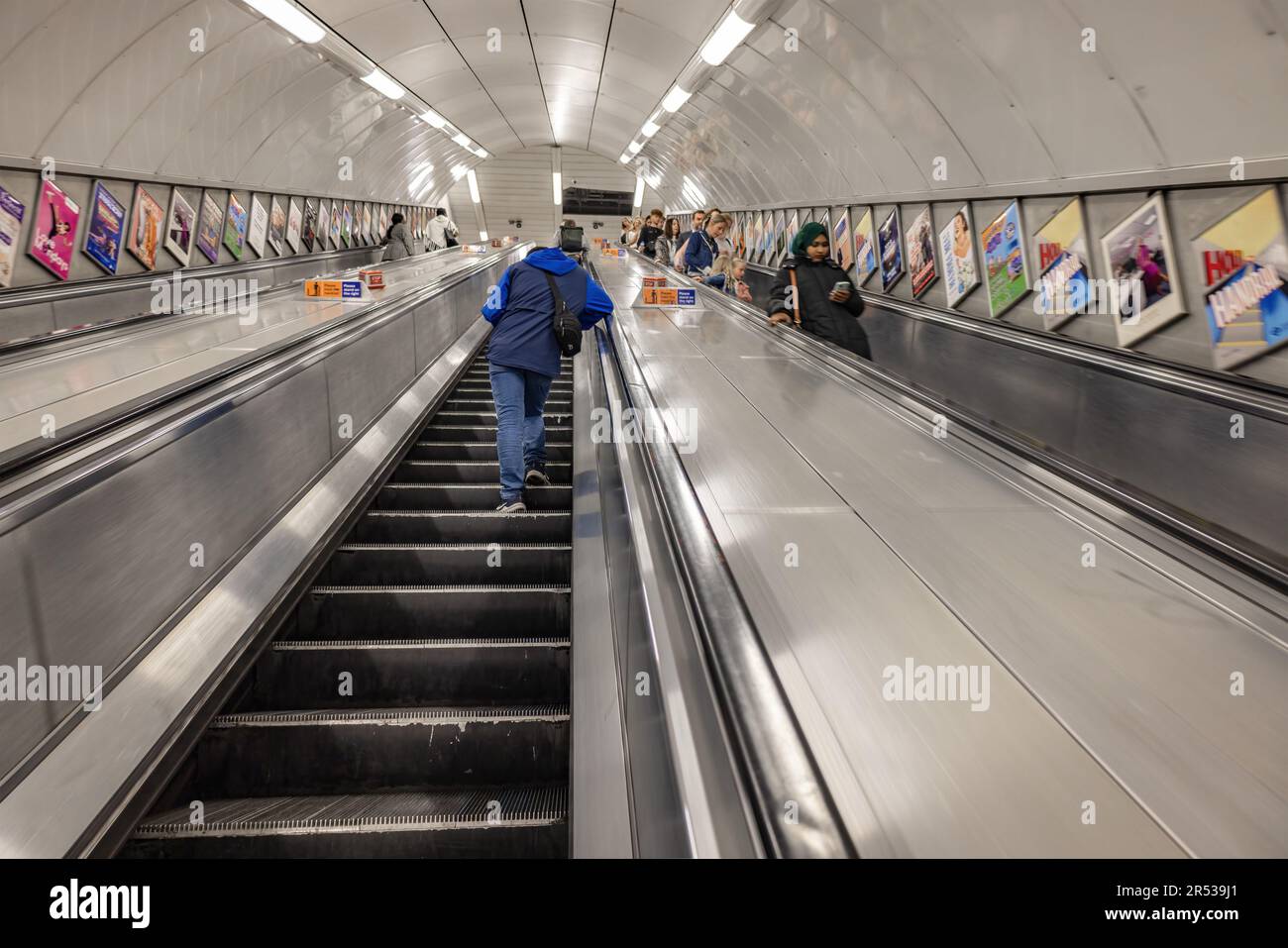 London, UK - May 20, 2023: Long exposure photography of escalators in a ...