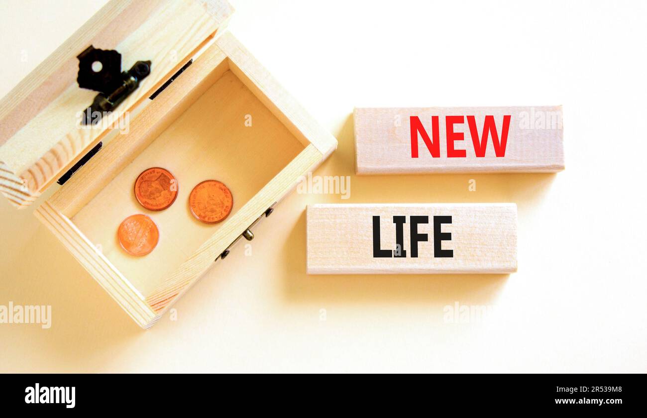 New life symbol. Concept words New life on wooden blocks on a beautiful ...