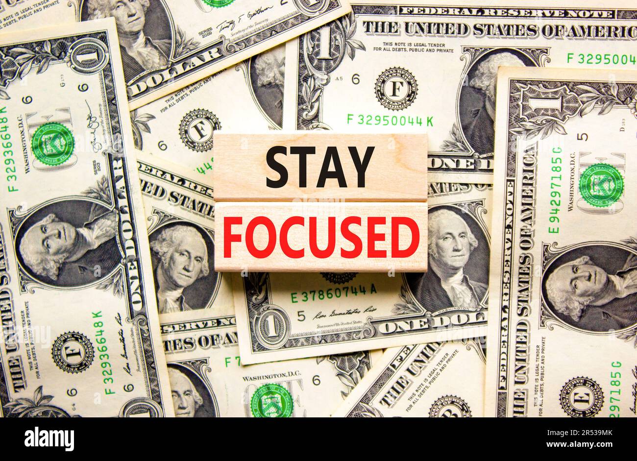 Stay focused symbol. Concept words Stay focused on wooden blocks on a ...