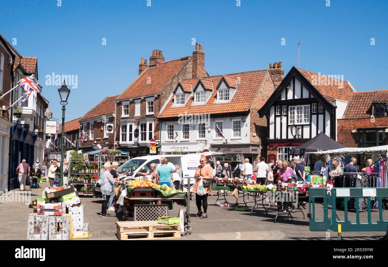 People shopping at Beverley Saturday market, East Yorkshire, England ...