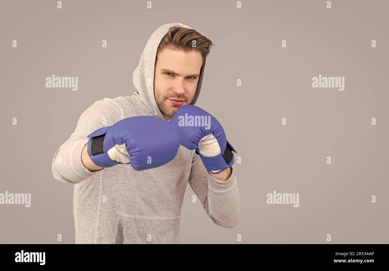 Boxer fighter standing in boxing stance. Fit sportsman wearing boxing ...