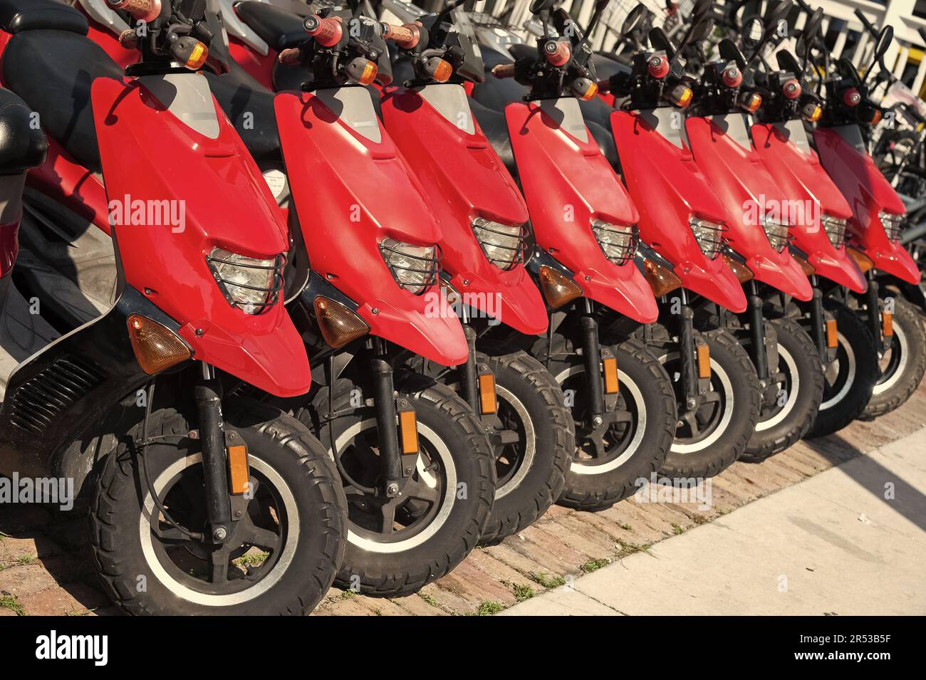 parked rental moped outdoor, corner view. photo of parked rental moped ...