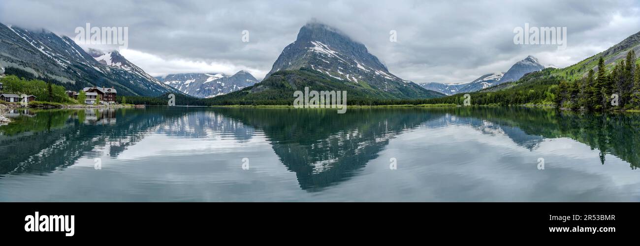 Spring at Swiftcurrent Lake - Panoramic view of Swiftcurrent Lake on a ...