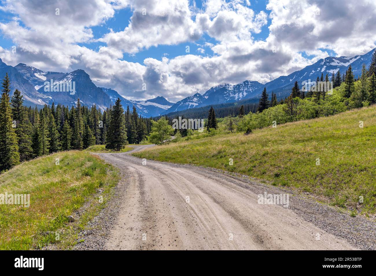 Spring Mountain Road - A dirt country road winding in Cut Bank Valley ...
