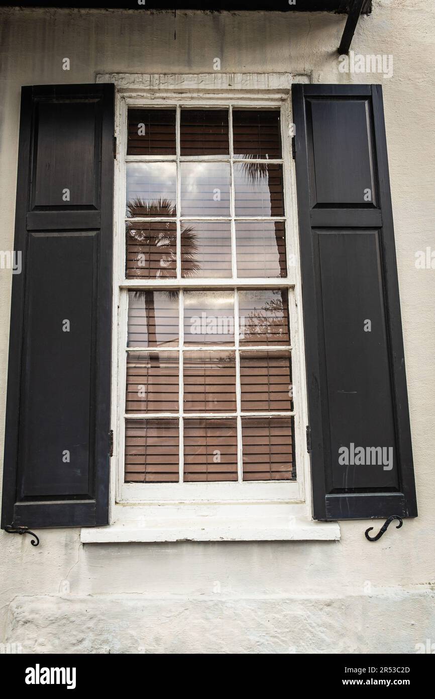 Close up of the color windows of a colonial era home in Charleston ...