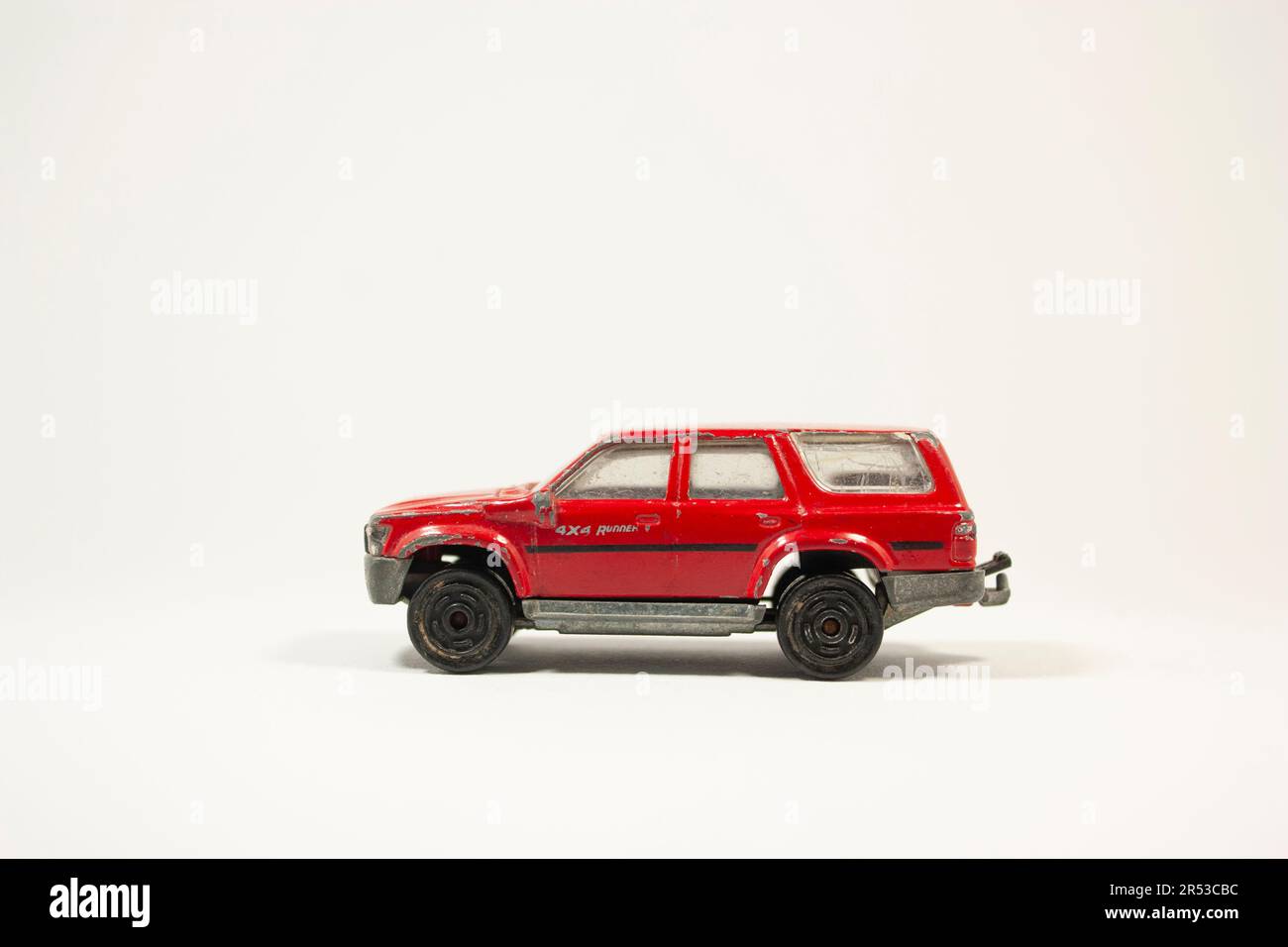 Sport Utility Vehicle toy car red color on white background Stock Photo ...