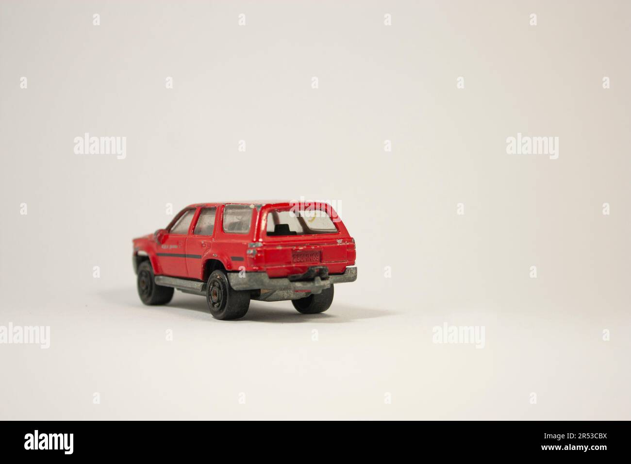 Sport Utility Vehicle toy car red color on white background Stock Photo ...