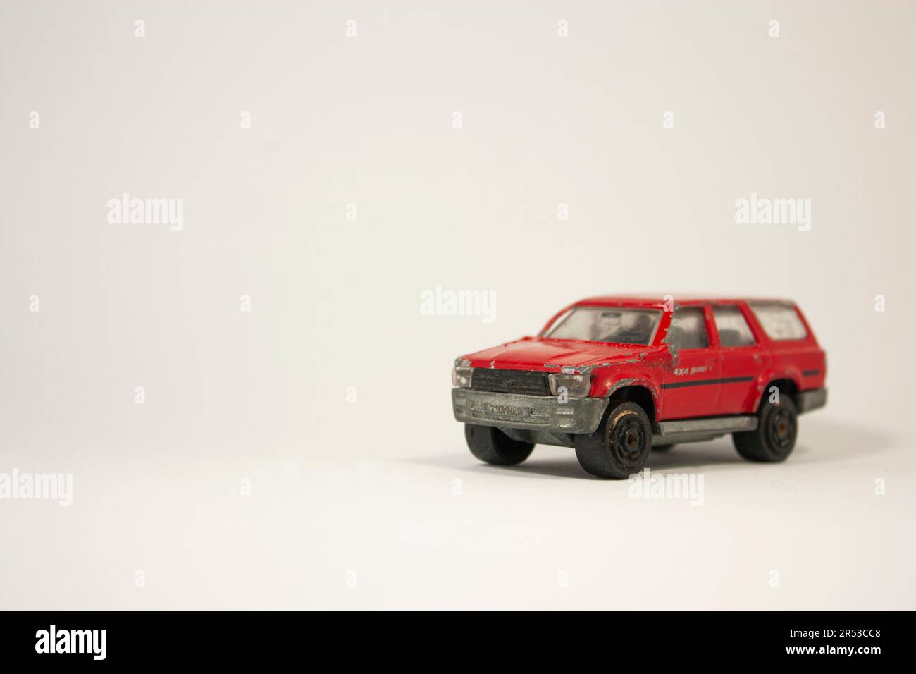 Sport Utility Vehicle toy car red color on white background Stock Photo ...