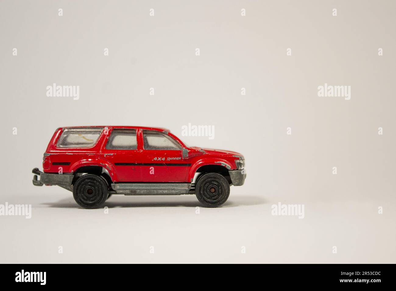 Sport Utility Vehicle toy car red color on white background Stock Photo ...