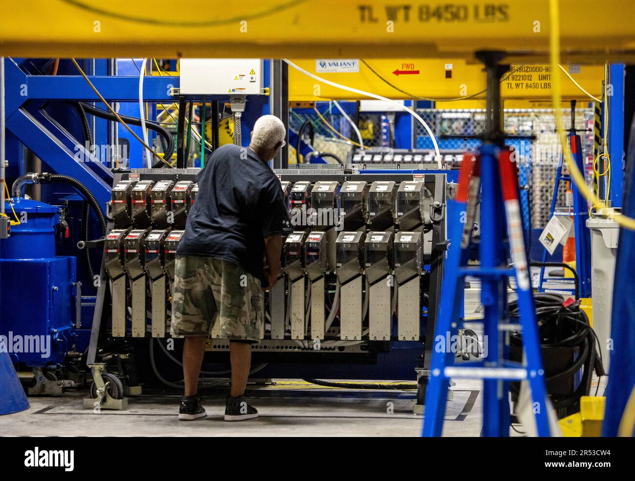 An employee works in on parts of the fuselage section at Boeing Co.'s ...