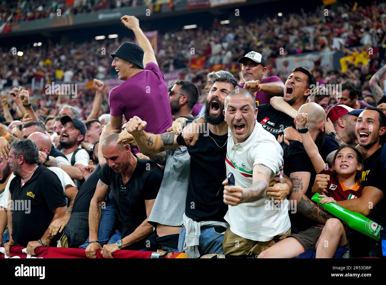Roma fans celebrate after Paulo Dybala (not pictured) scores their side ...