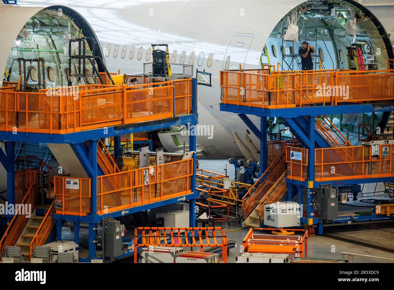Boeing employees assemble 787s inside their main assembly building on ...