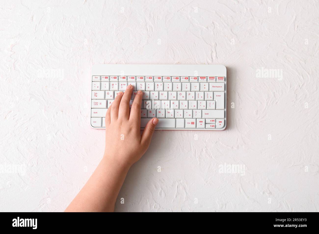 Female hand with modern computer keyboard on light background Stock ...
