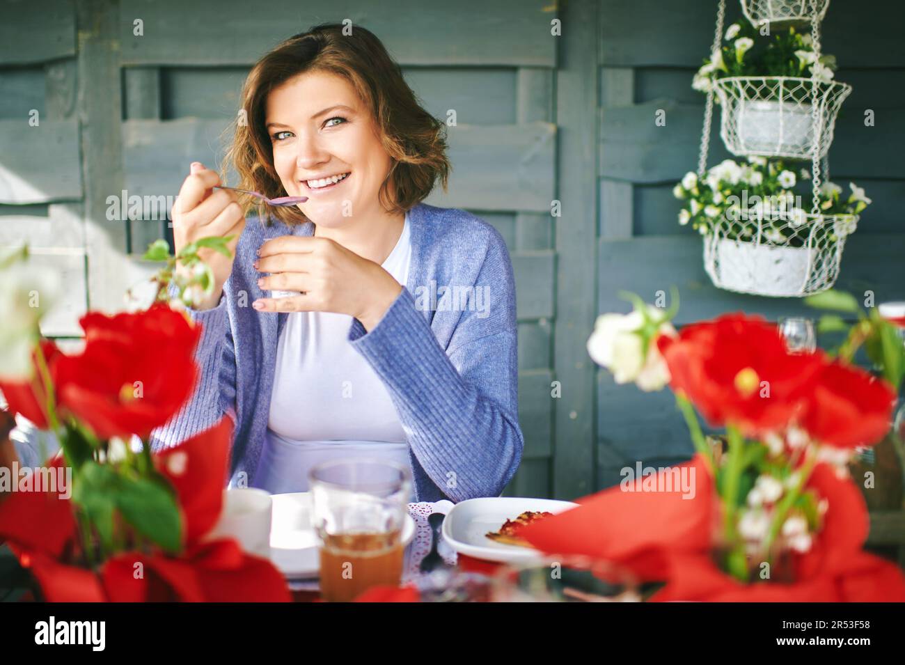 Beautiful woman setting table hi-res stock photography and images - Alamy