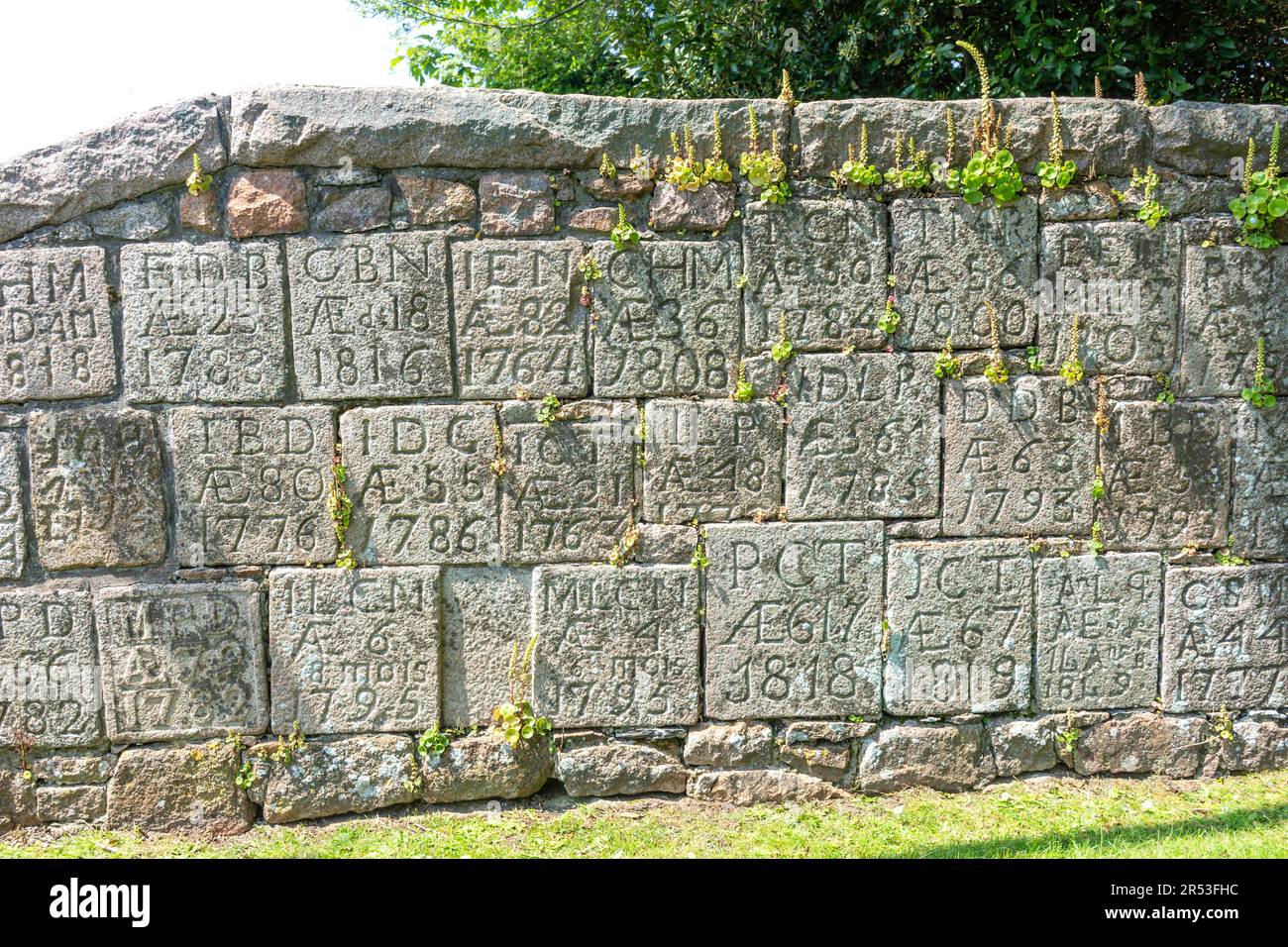 Ancient burial plaques in churchyard, St John's Parish Church, La Rue ...