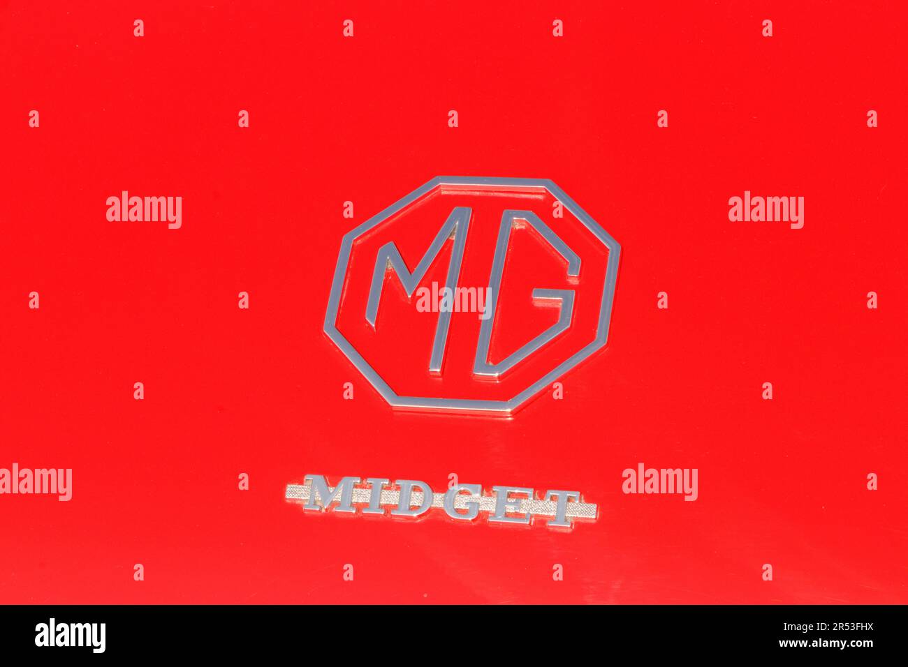 chrome MG midget chrome bonnet badge log on red car at vintage classic ...