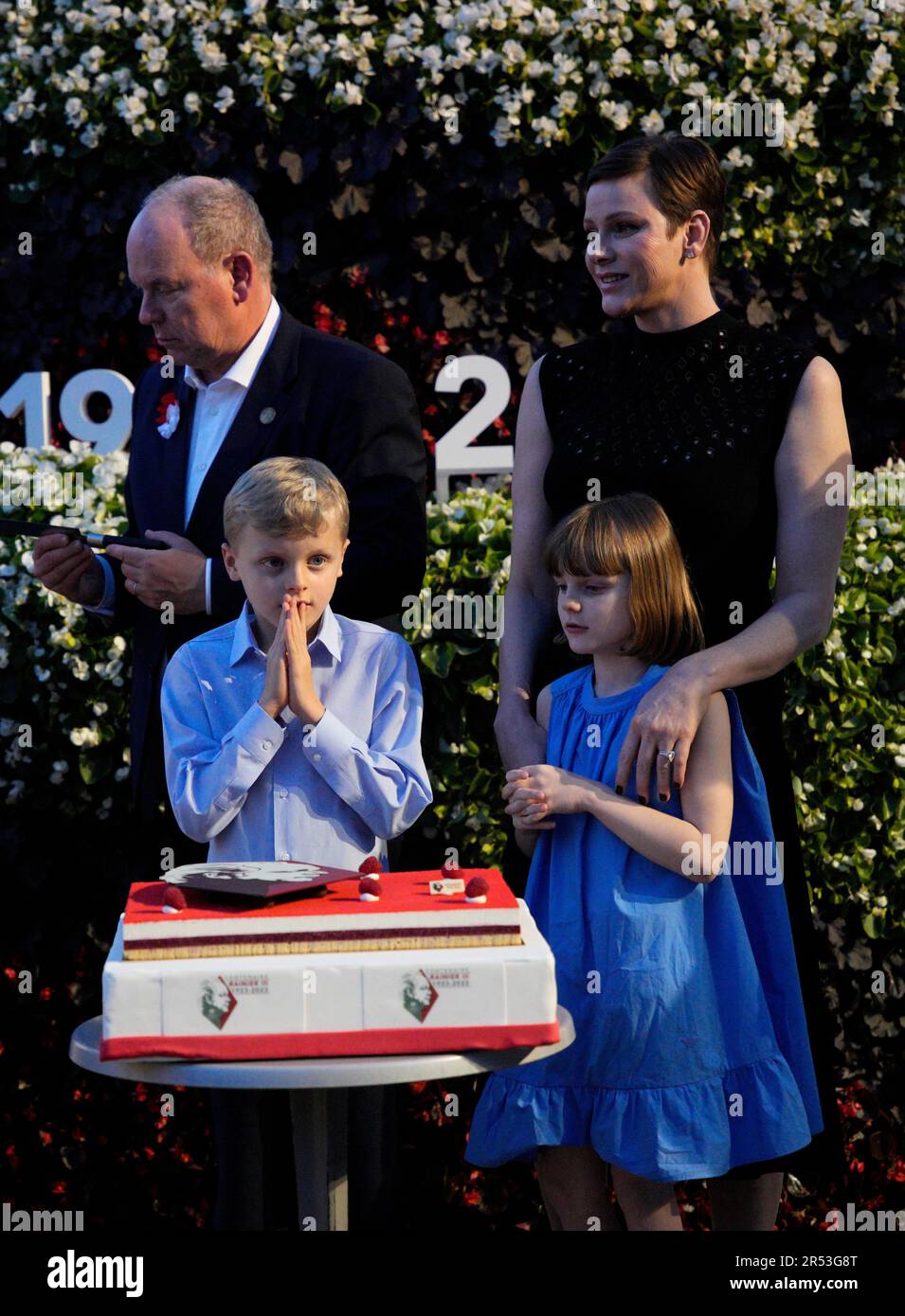 Prince Albert II of Monaco, left, his wife Princess Charlene, right ...