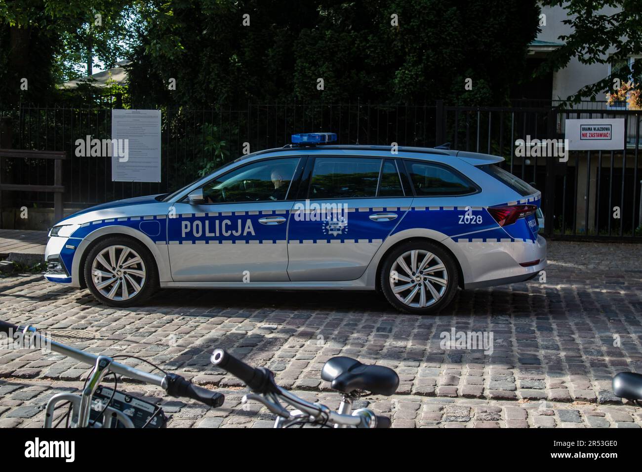 Warsaw, Poland - May 28, 2023 Police car driving in the city center of ...
