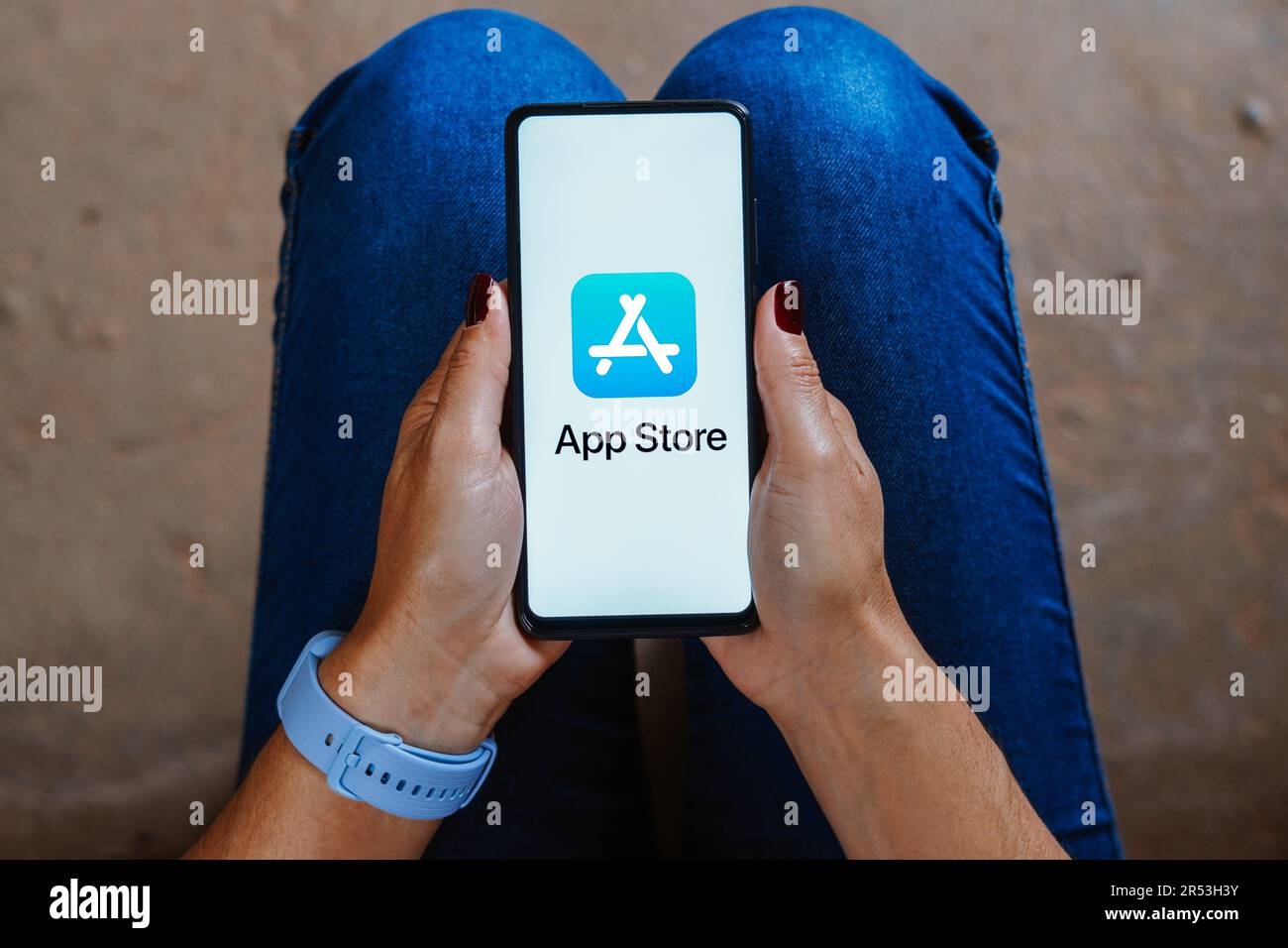 In this photo illustration, the App Store logo is displayed on a ...