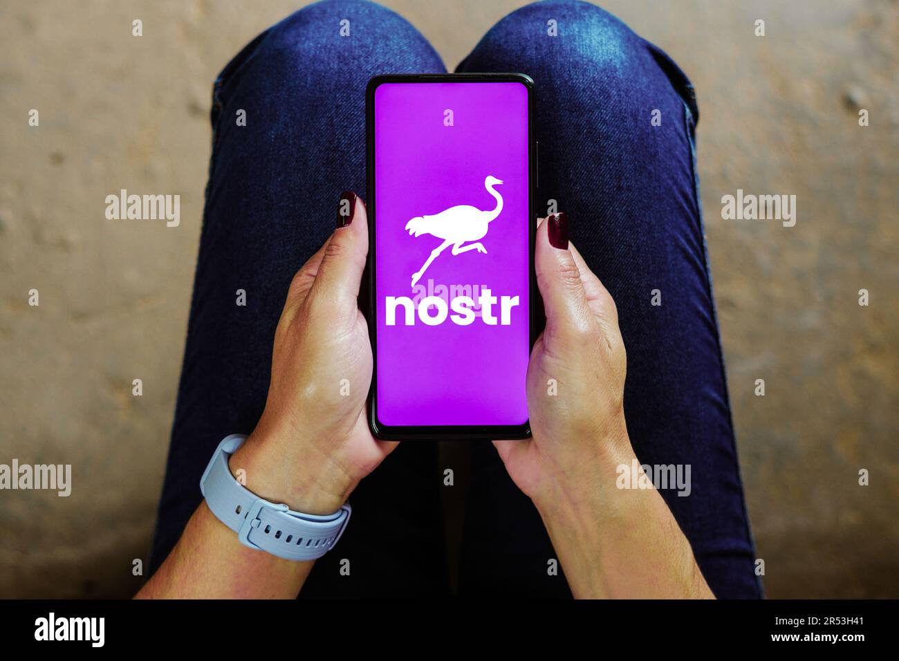 In this photo illustration, the Nostr logo is displayed on a smartphone ...