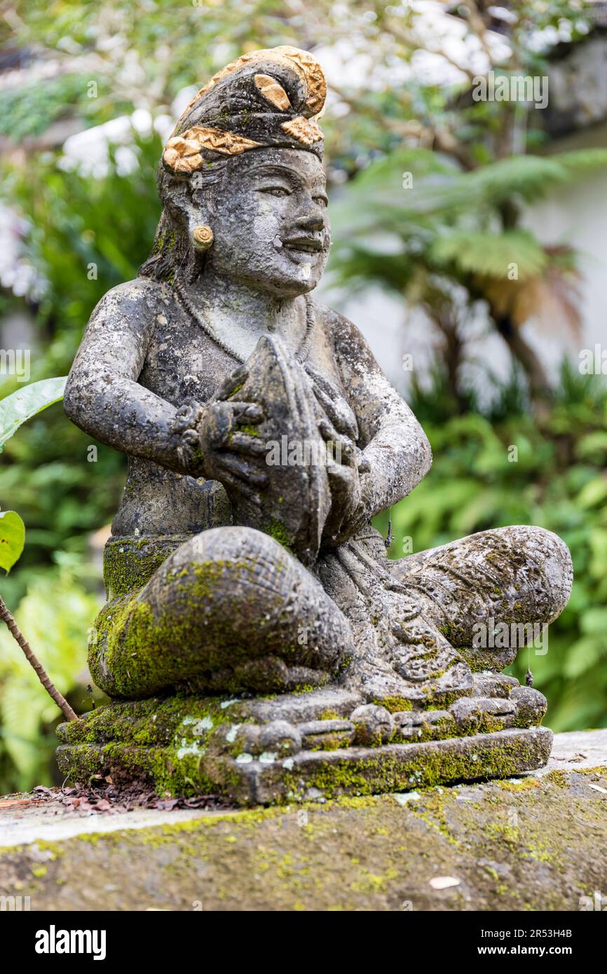 Hindu statue in the jungle of Bali Indonesia Stock Photo - Alamy