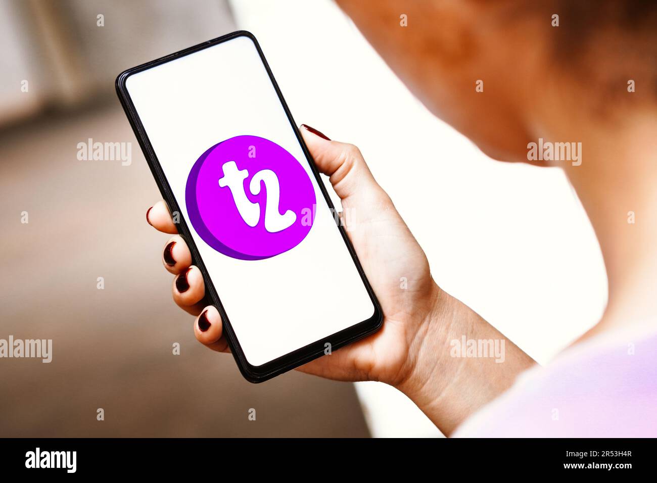 In this photo illustration, the T2 Social logo is displayed on a ...