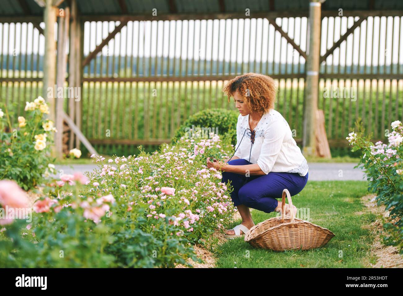 Outdoor Portrait Of Beautiful 50 Year Old Woman Enjoying Nice Day In