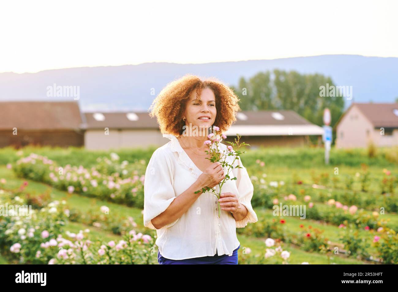 Countryside lifestyle, outdoor portrait of beautiful middle age 50 - 55 ...