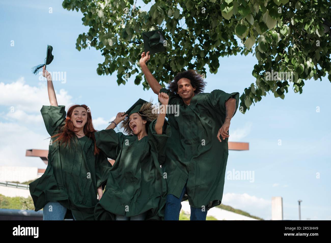 Group of college students celebrating their college graduation. Concept ...