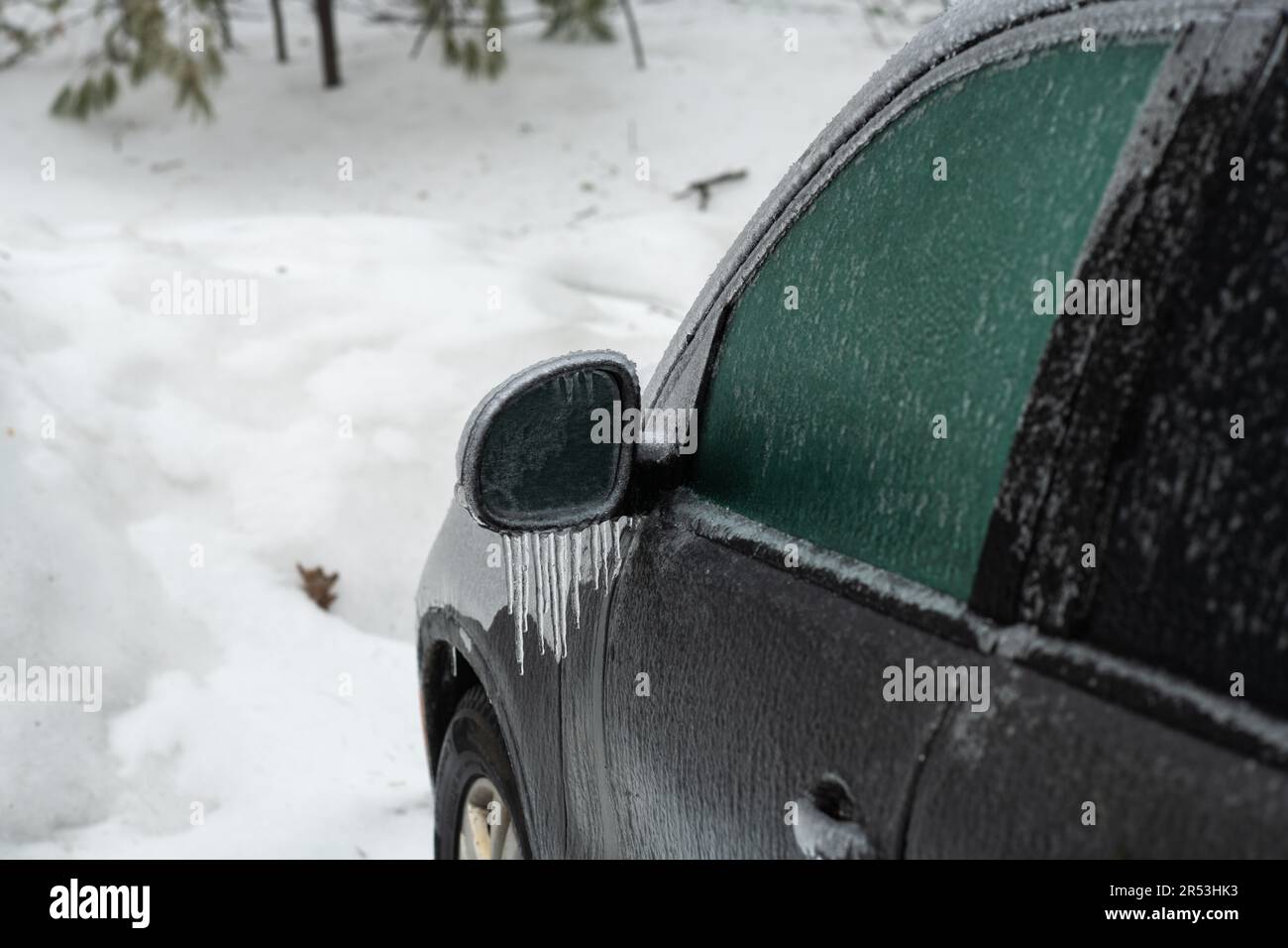 Car covered in thick layer of ice from extreme ice storm Stock Photo ...