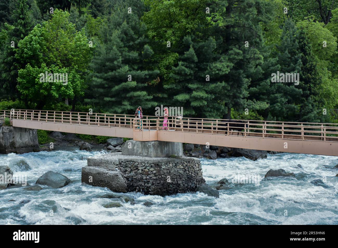 Sonamarg, India. 31st May, 2023. Kashimiri residents walk along the ...