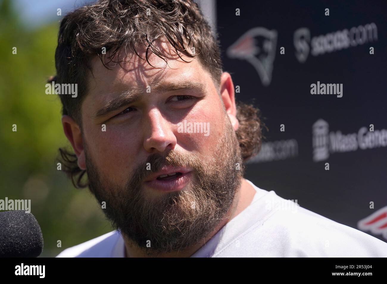 New England Patriots center David Andrews speaks with reporters ...