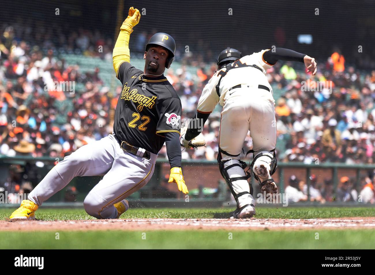 Pittsburgh Pirates' Andrew McCutchen, left, slides into home plate past ...