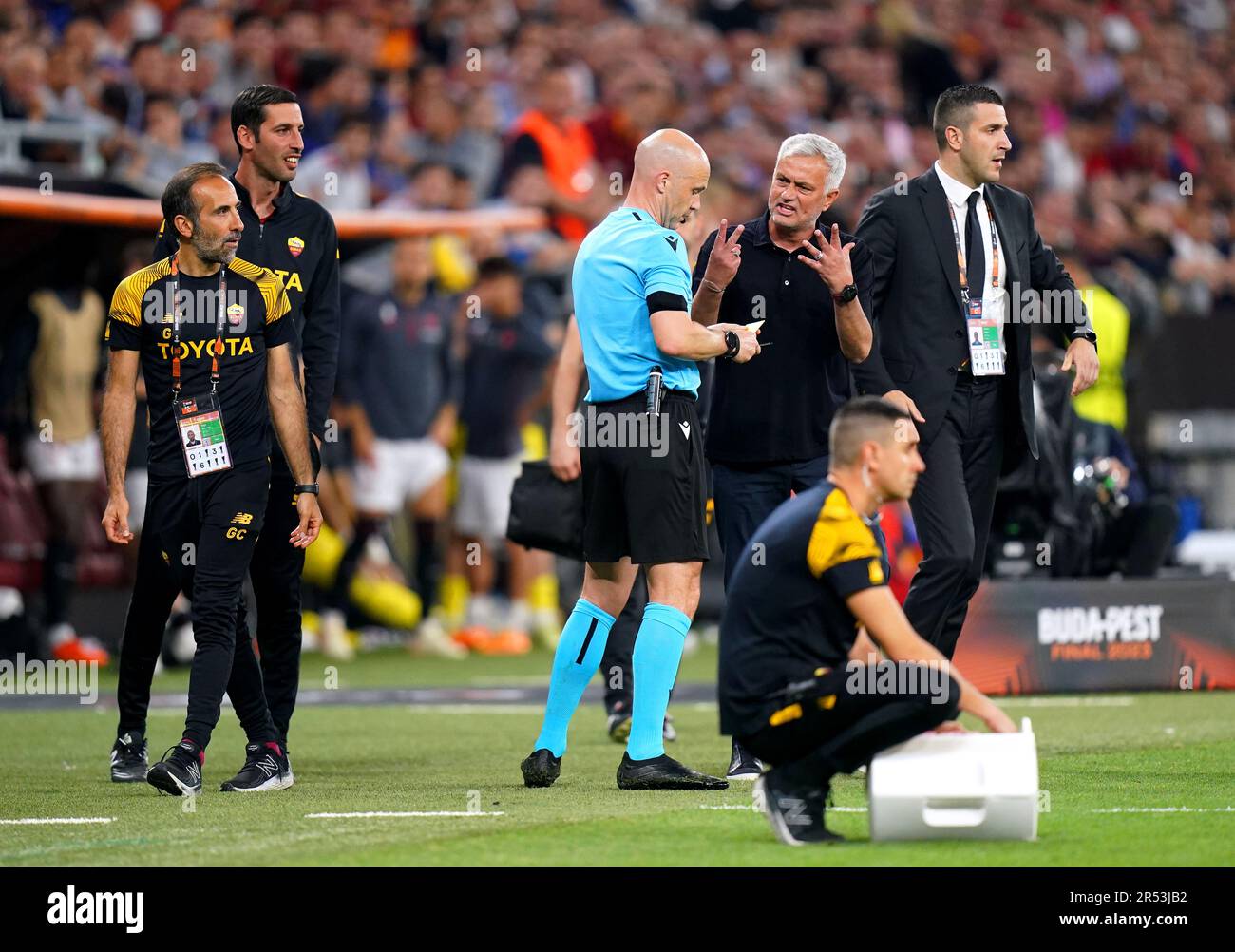 Roma manager Jose Mourinho exchanges words with referee Anthony Taylor ...