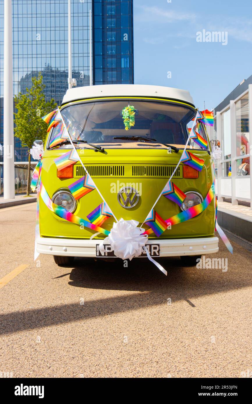vintage green Type 2 volkswagen bus kombi with rainbow flags bunting at ...
