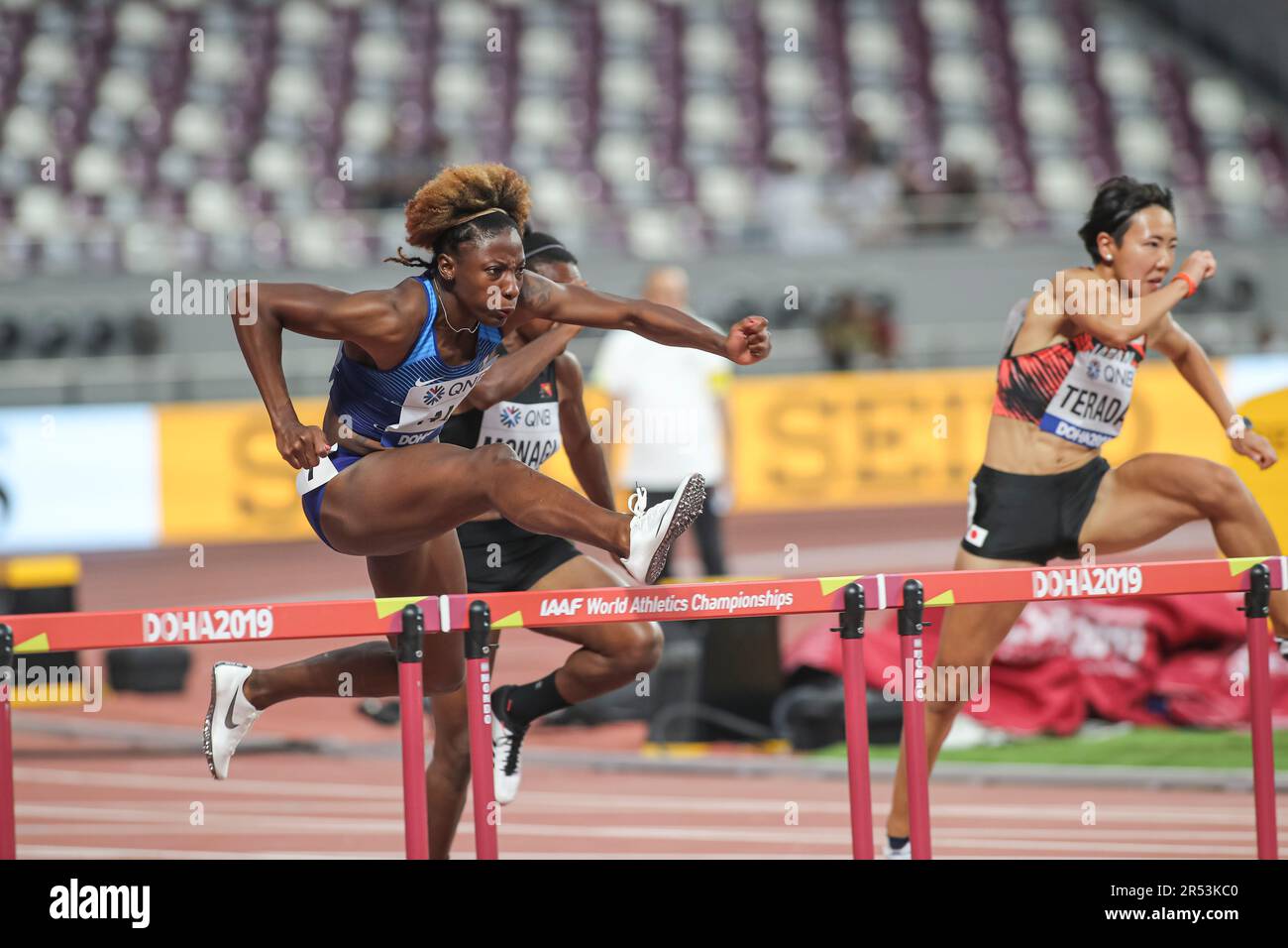 Nia Ali running the 100m hurdles at the 2019 World Athletics ...