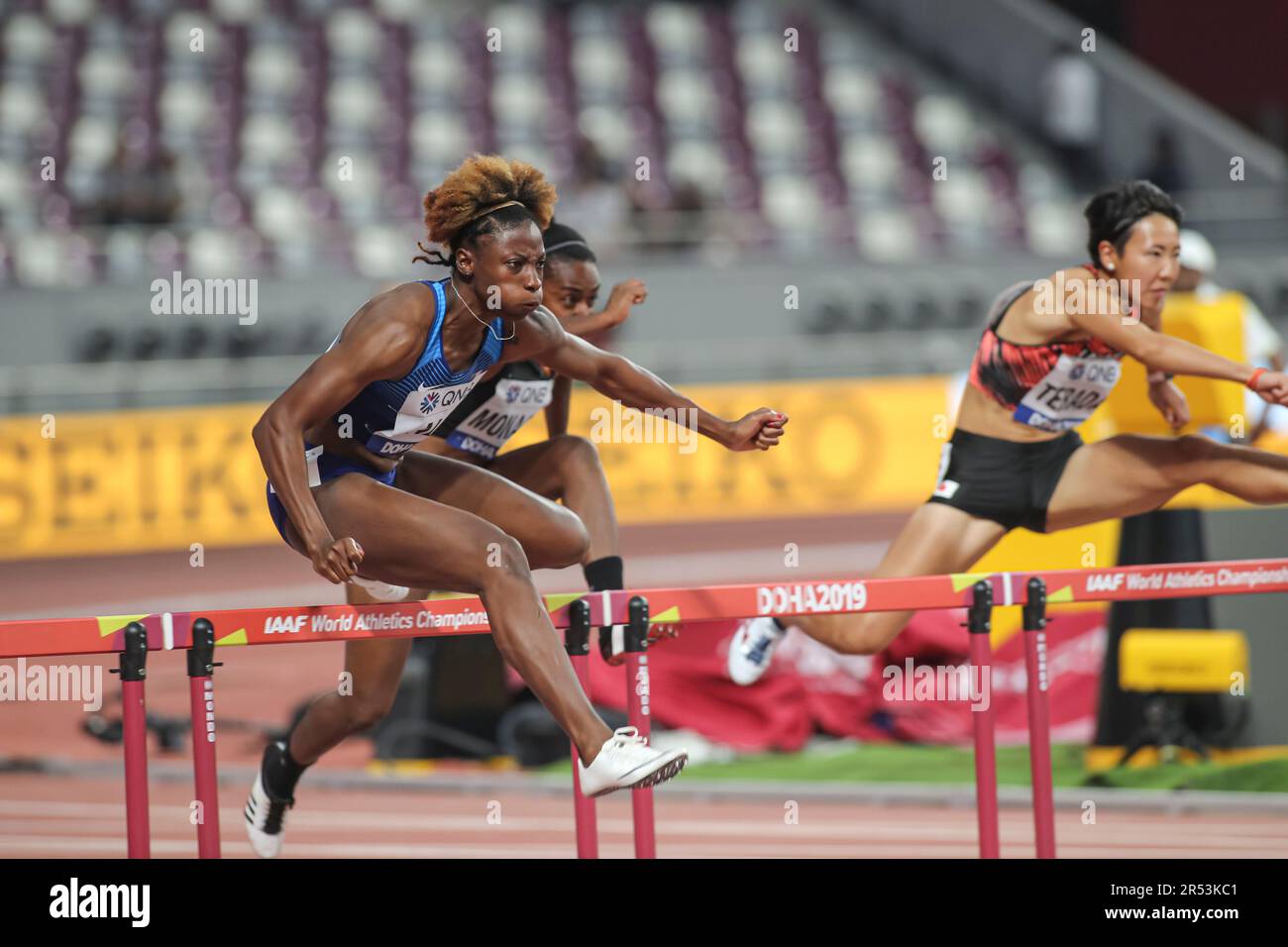 Nia Ali running the 100m hurdles at the 2019 World Athletics ...