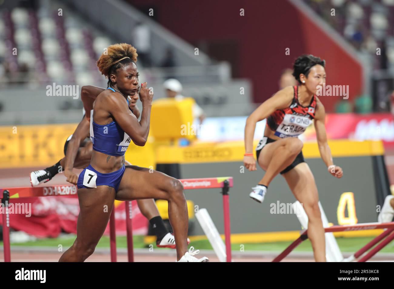 Nia Ali running the 100m hurdles at the 2019 World Athletics ...