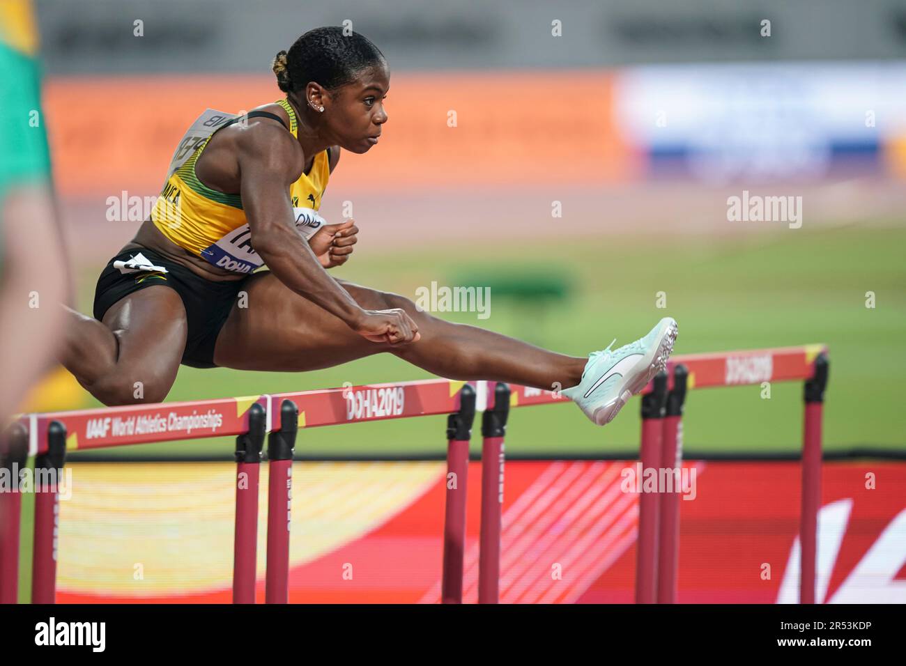 Megan Tapper running the 100m hurdles at the 2019 World Athletics ...
