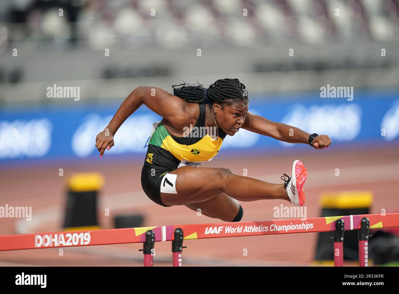 Yanique Thompson running the 100m hurdles at the 2019 World Athletics ...